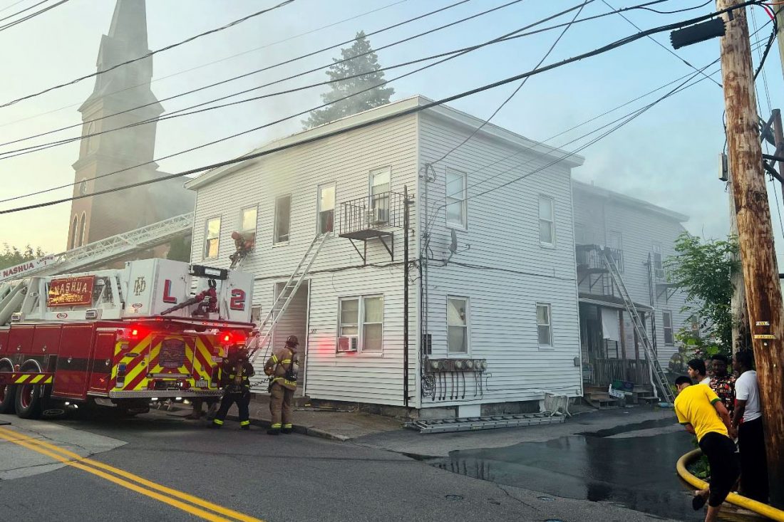 Firefighters rescue four residents from second-floor windows in 2-alarm ...